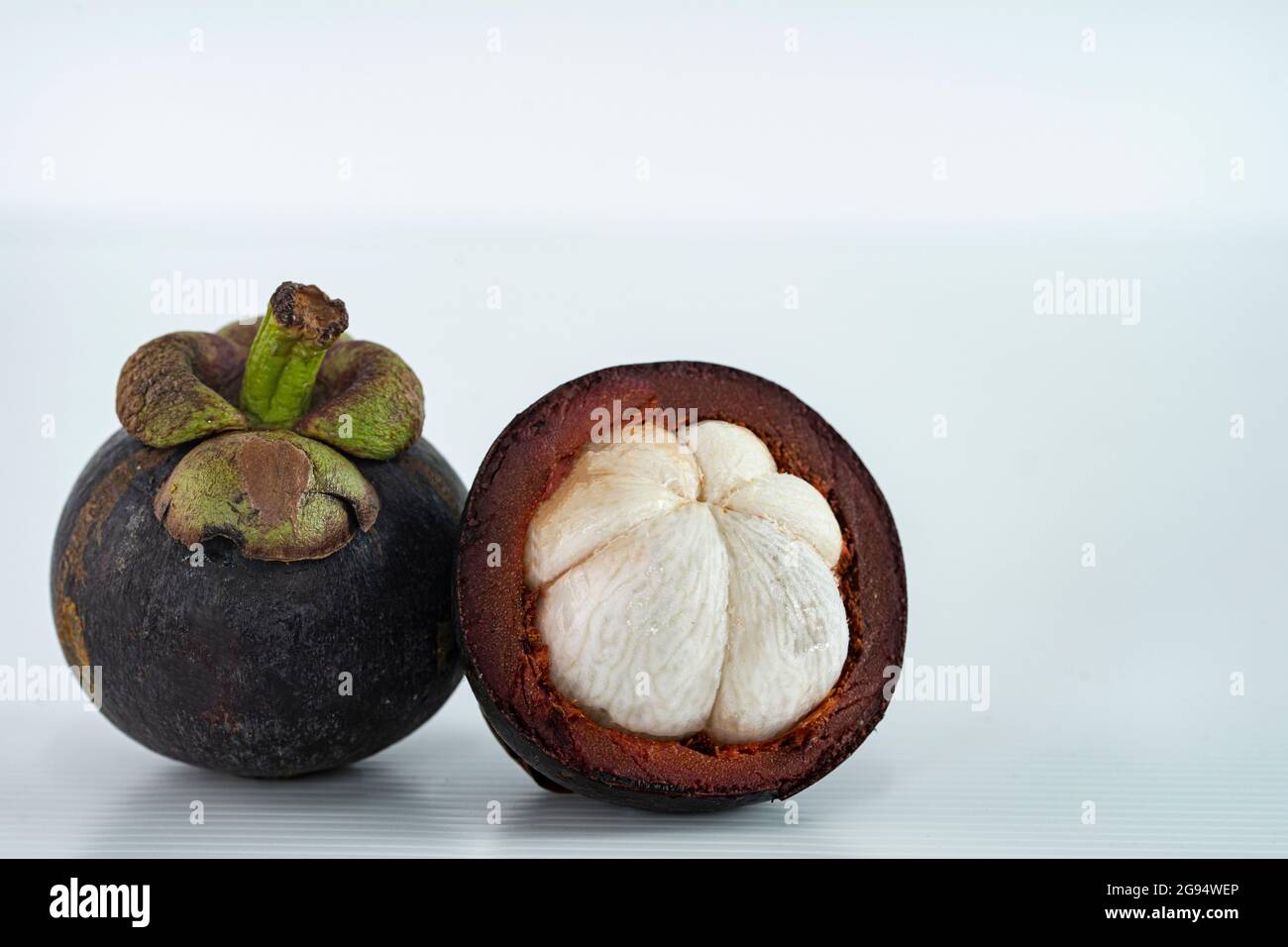 Ripe mangosteen or locally known as manggis, a famous fruit in Malaysia ...