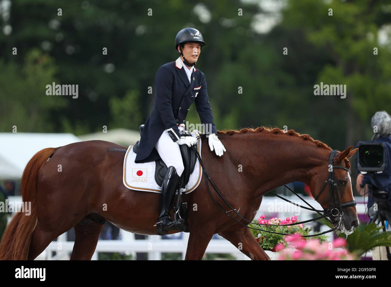 Tokyo, Japan. 24th July, 2021. Kazuki Sado (JPN) Equestrian : Dressage ...
