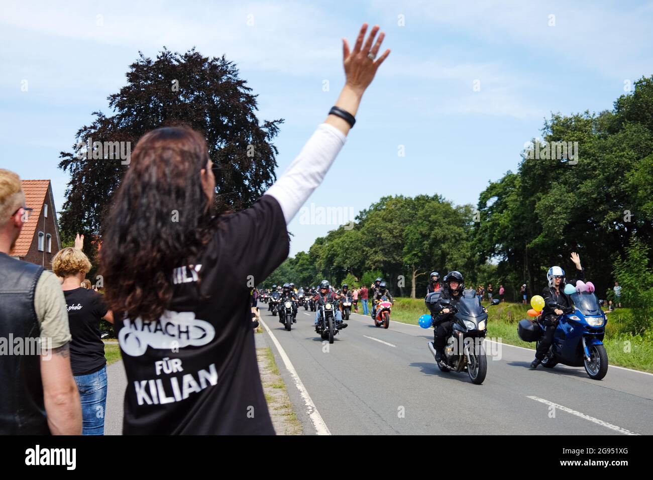 Rhauderfehn, Germany. 24th July, 2021. A woman wearing a T-shirt with ...