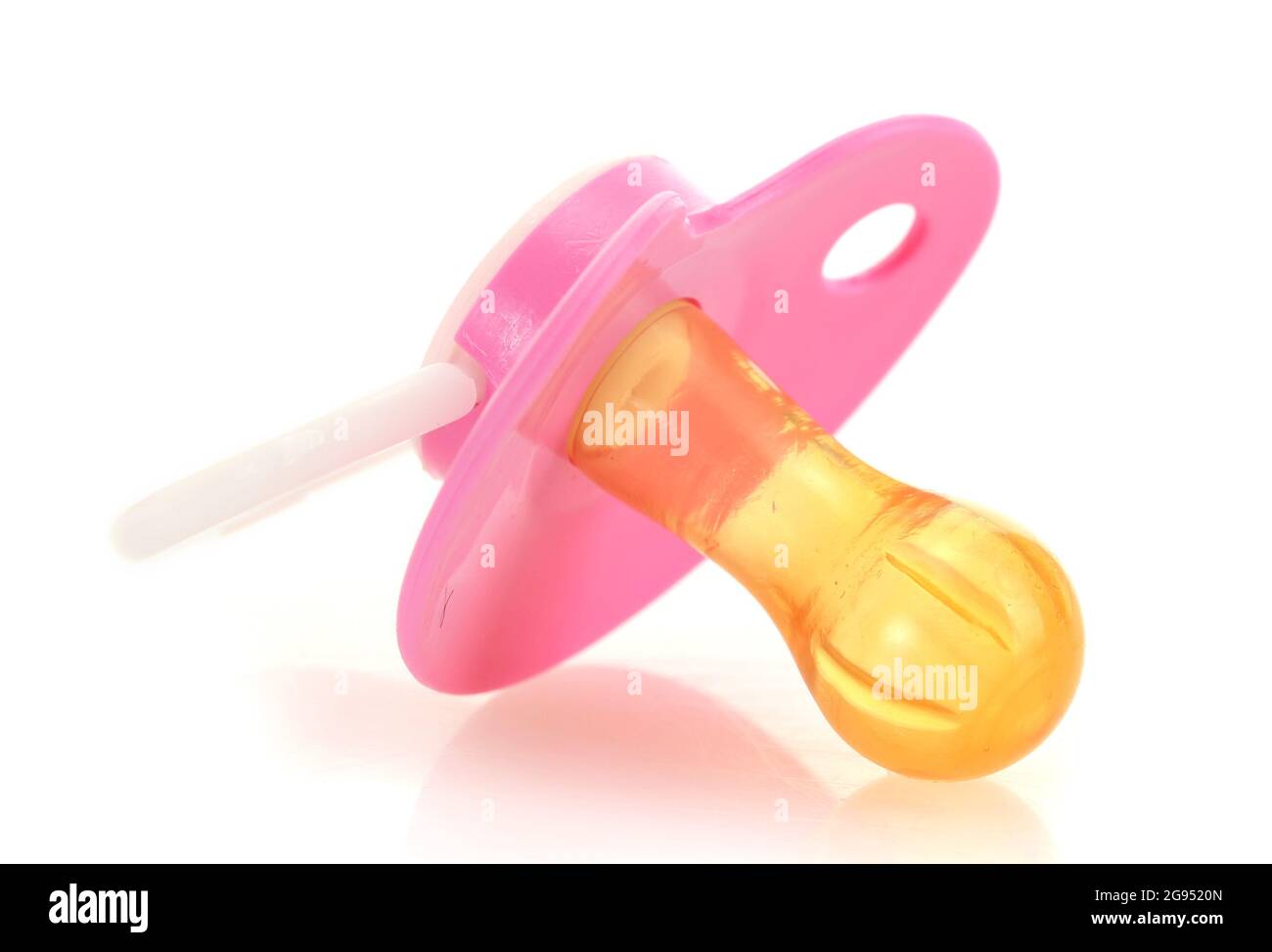pink baby's pacifier isolated on white background Stock Photo - Alamy