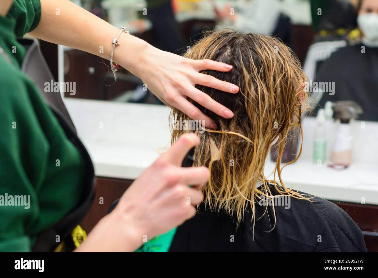 Combing wet hair, clean and washed head, preparation for a haircut. new ...