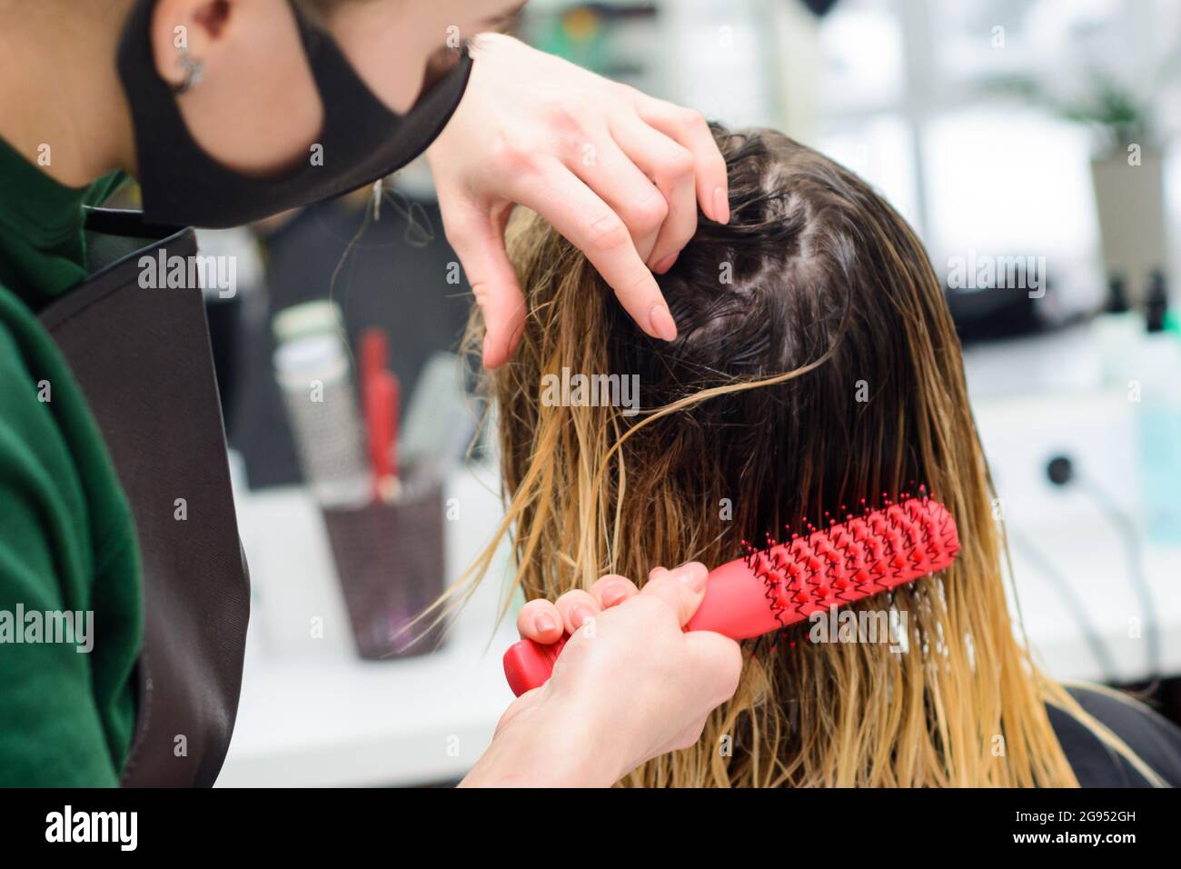 Combing wet hair, clean and washed head, preparation for a haircut. new ...