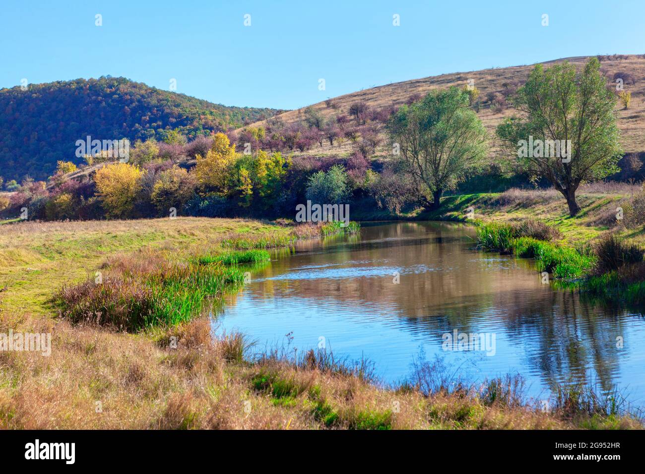 Idyllic valley with river . Awesome nature in September Stock Photo - Alamy