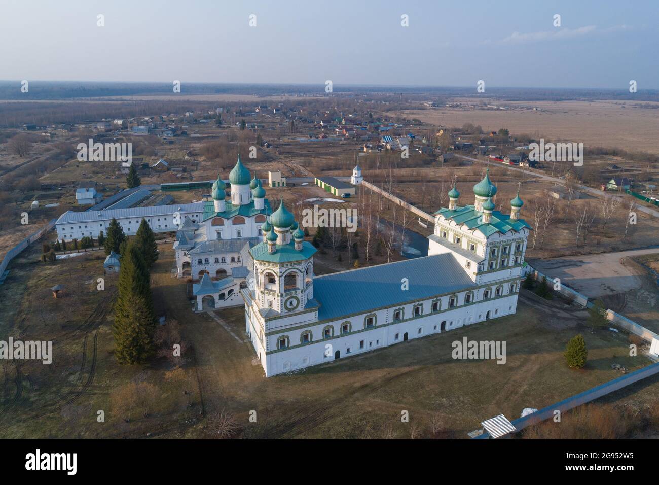 Above the ancient churches of the Nikolo-Vyazhishchsky monastery in April. Vyazhishchi. Novgorod ...