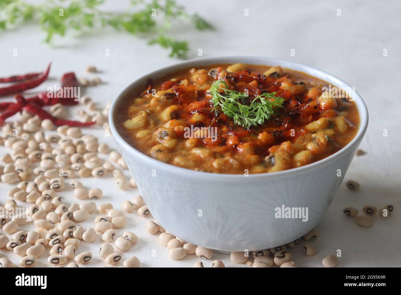 A gravy with white cowpea beans also known as black eyed pea. Boiled ...