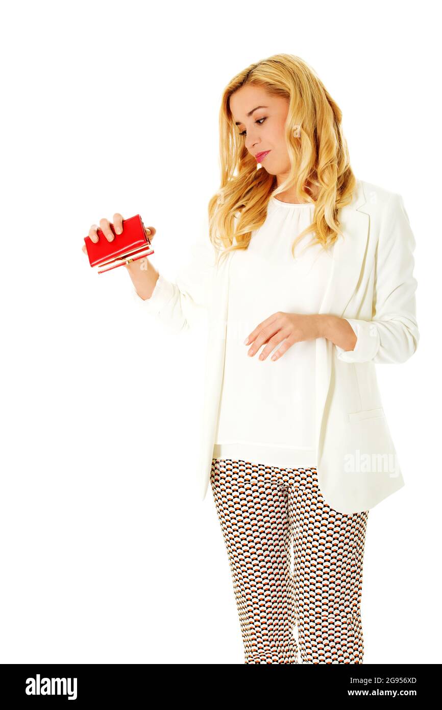 Beautiful caucasian business woman checking her empty red wallet ...