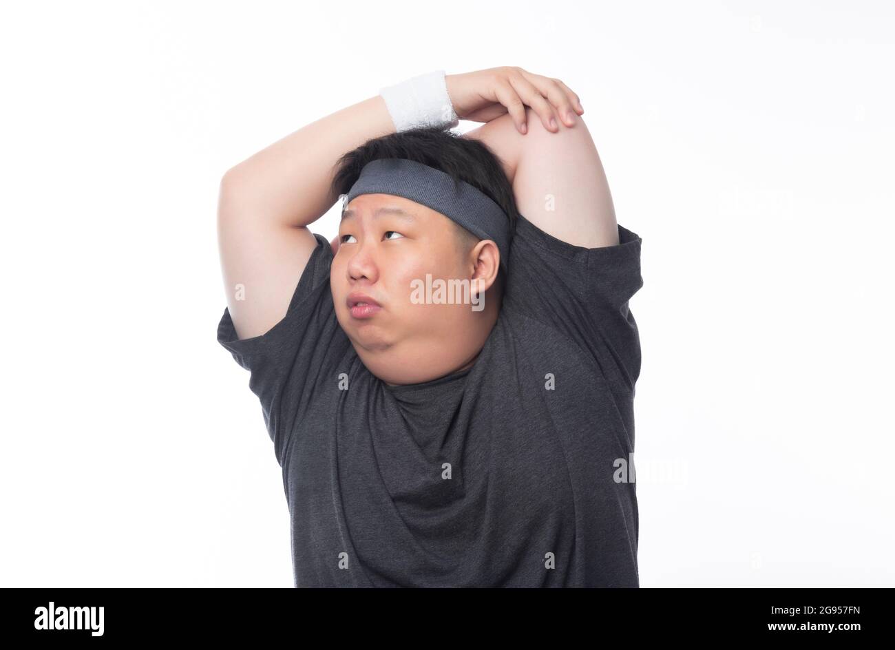 Young Asian funny fat sport man stretching before exercise isolated on ...