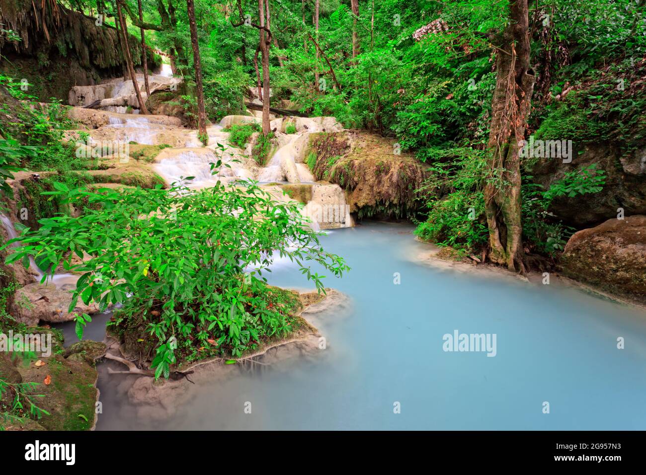 Limestone waterfall in tropical forest, west of Thailand Stock Photo ...