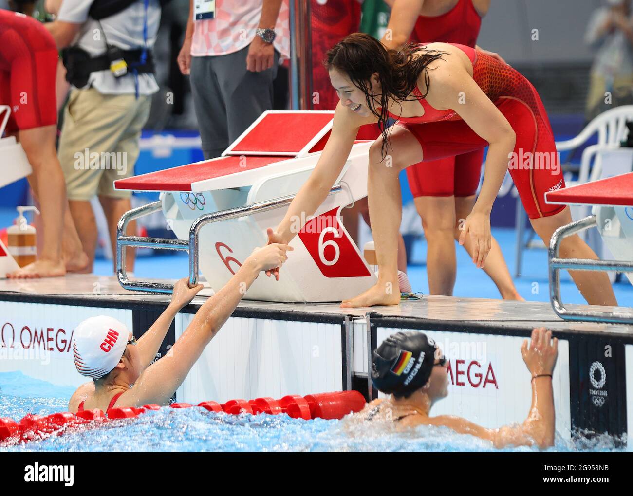 Tokyo, Japan. 24th July, 2021. Zhu Menghui (R) and Wu Qingfeng of team ...