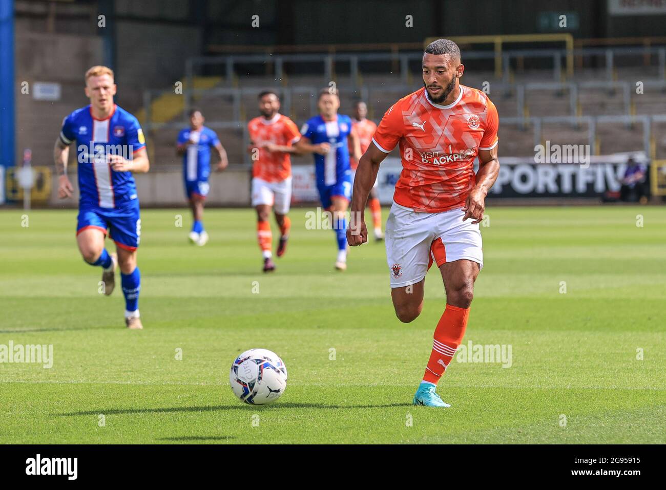 CJ Hamilton of Blackpool breaks with the ball Stock Photo - Alamy