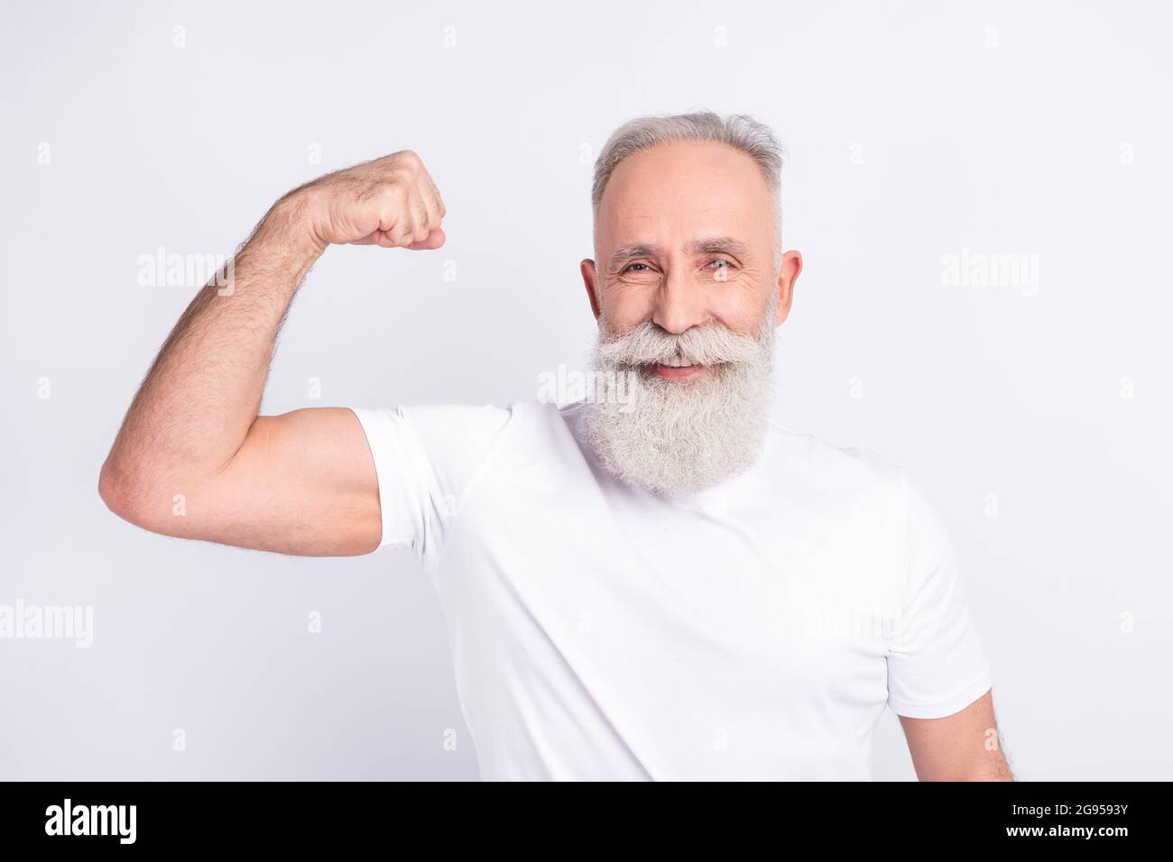 Photo of happy strong old grandfather good mood smile show biceps power ...
