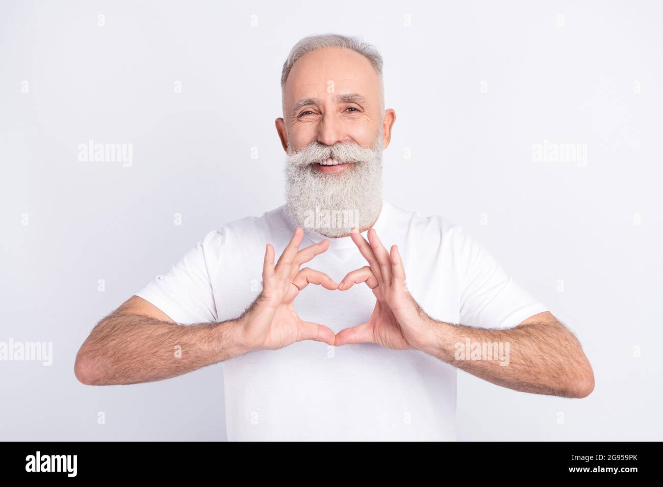 Portrait of attractive cheerful kind amorous man boyfriend showing ...