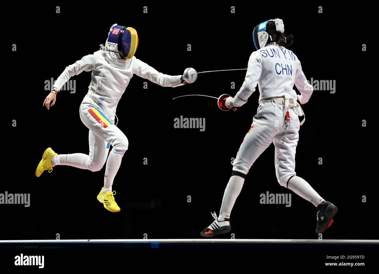 Tokyo. 24th July, 2021. Sun Yiwen (R) of China competes with Ana Maria ...