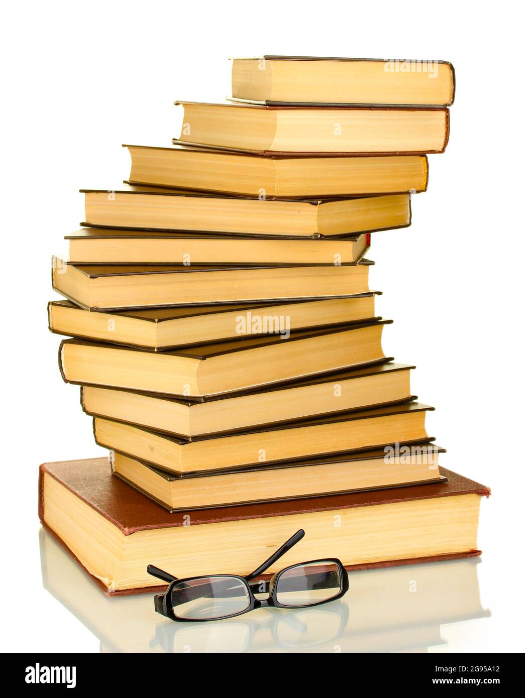 tower of books with glasses isolated on white background Stock Photo ...