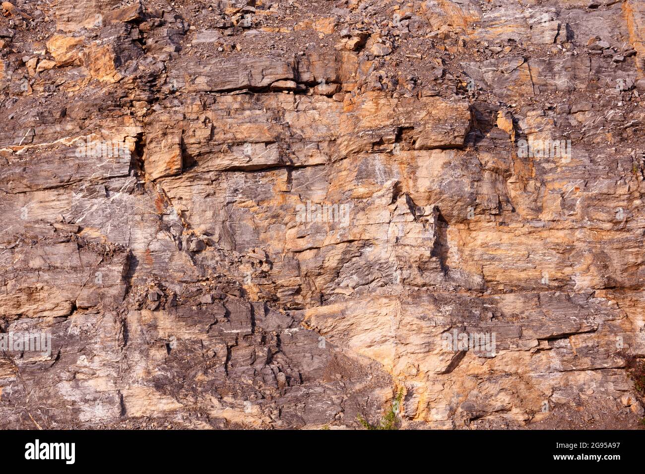 Layers of stone under ground in mine Stock Photo - Alamy
