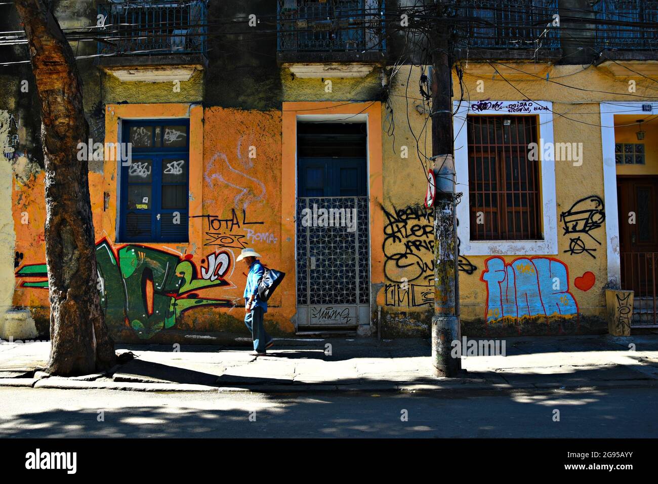 Lonesome cowboy walking on the streets of Santa Teresa a neighborhood ...