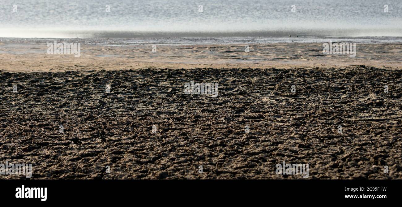 Dry soil at low tide on dry season in Brazil Stock Photo - Alamy