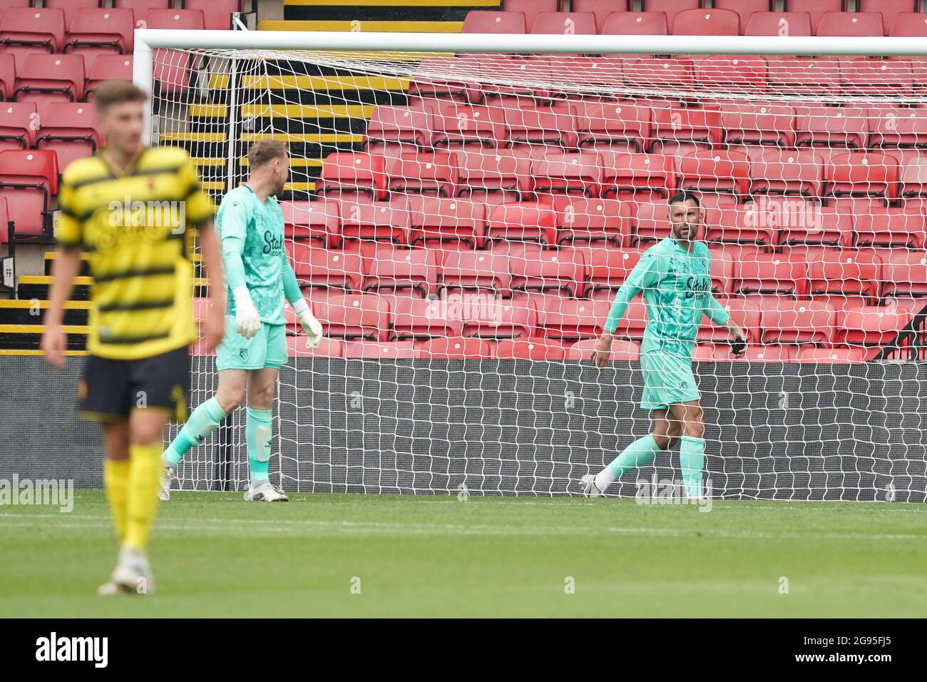 Watford's goalkeeper Ben Foster (right) is substituted just after half ...