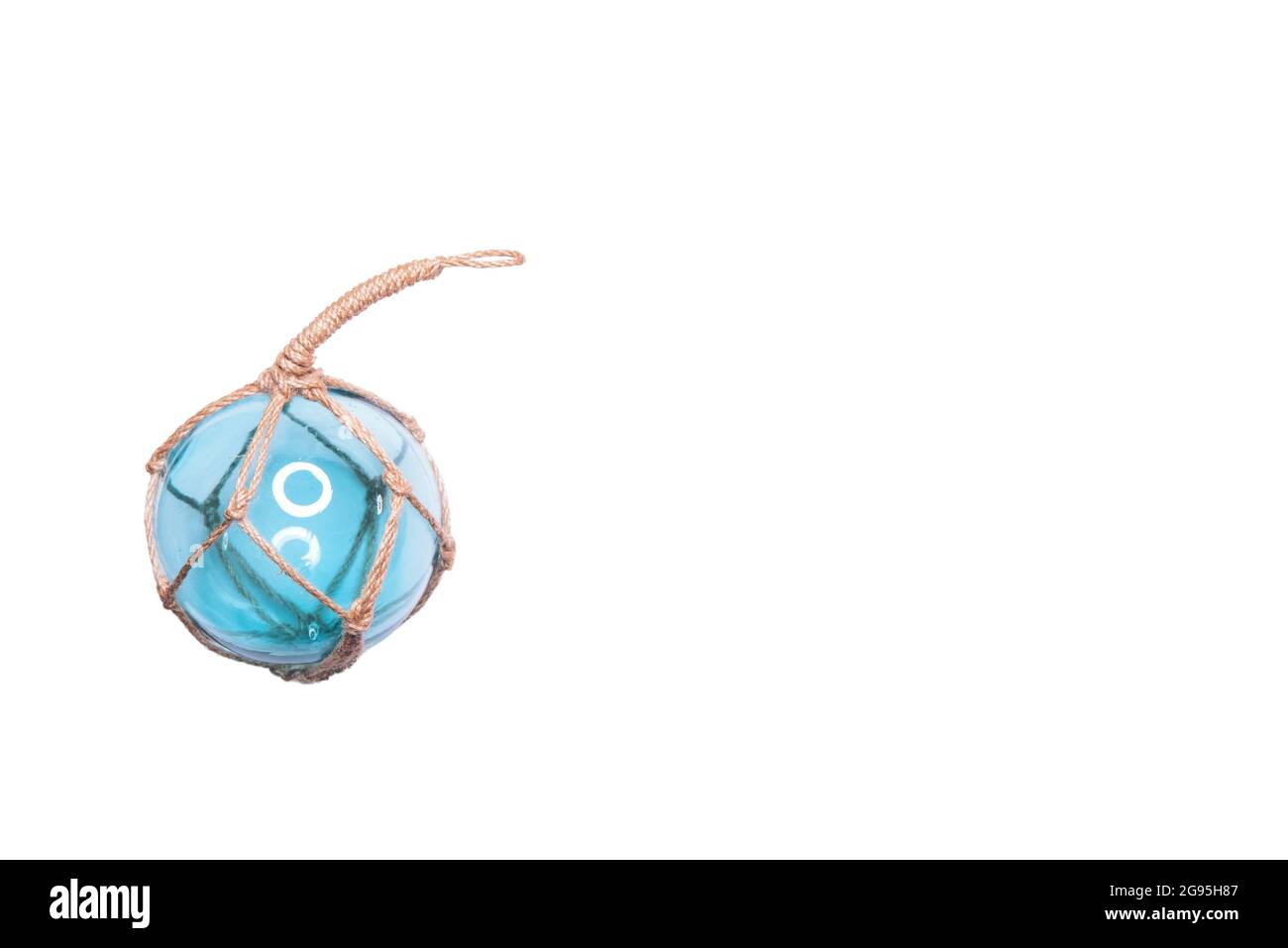 Glass fishing net round buoy. One glass sphere with ropes isolated on ...