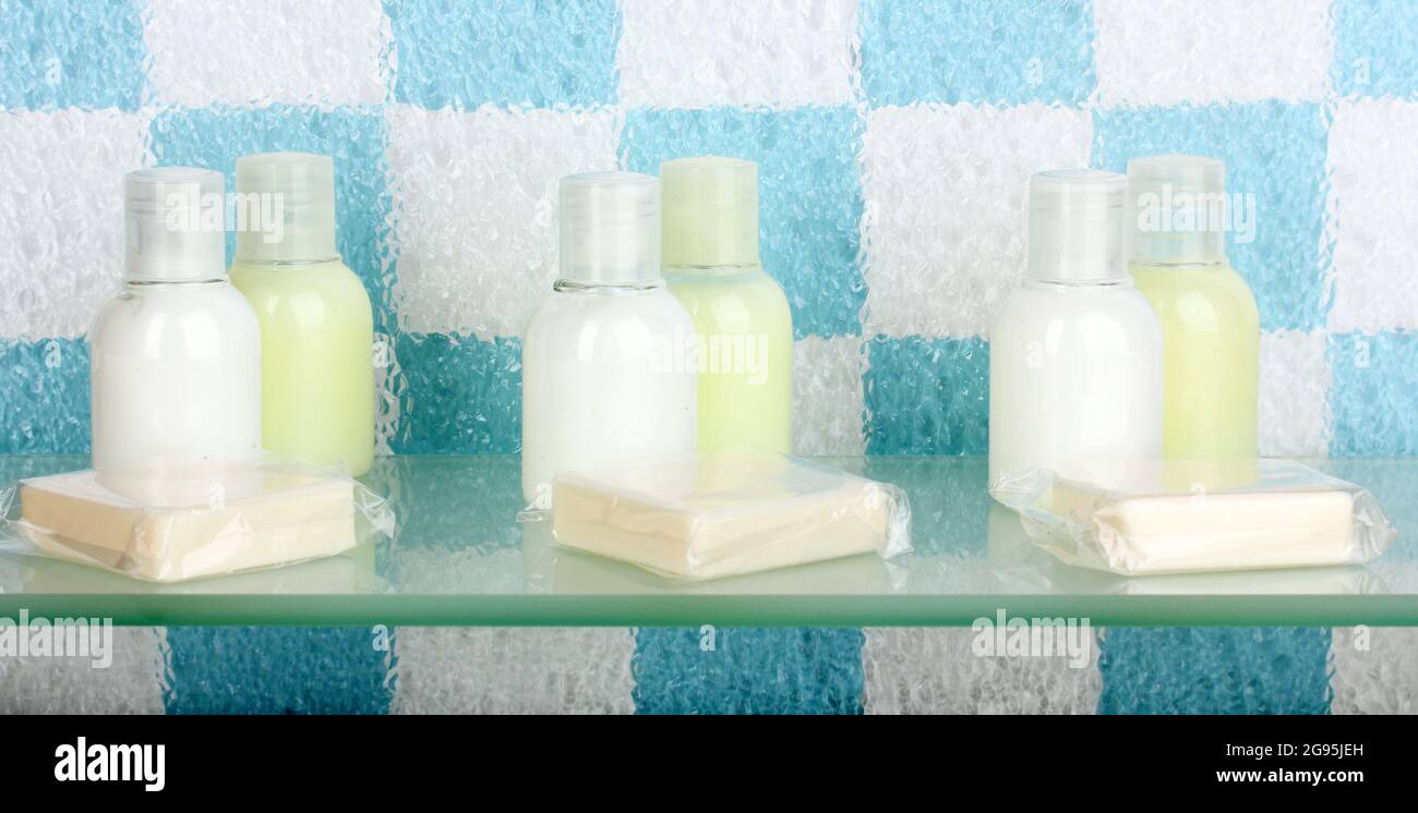 Hotel amenities kit on shelf in bathroom Stock Photo - Alamy
