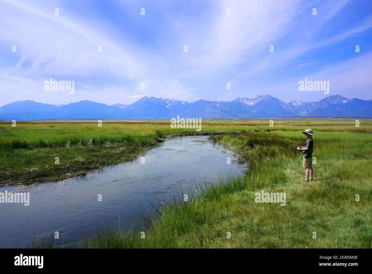 Boy Fly Fishing for Trout, Owens River, Mono, California, USA Stock ...