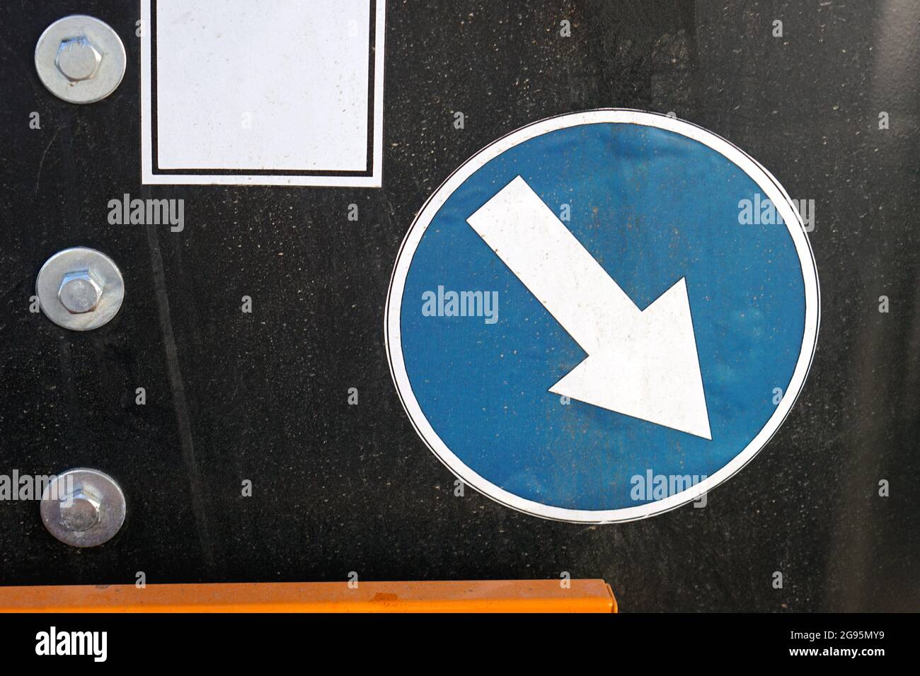 White arrow sign direction at vehicle rear end Stock Photo - Alamy
