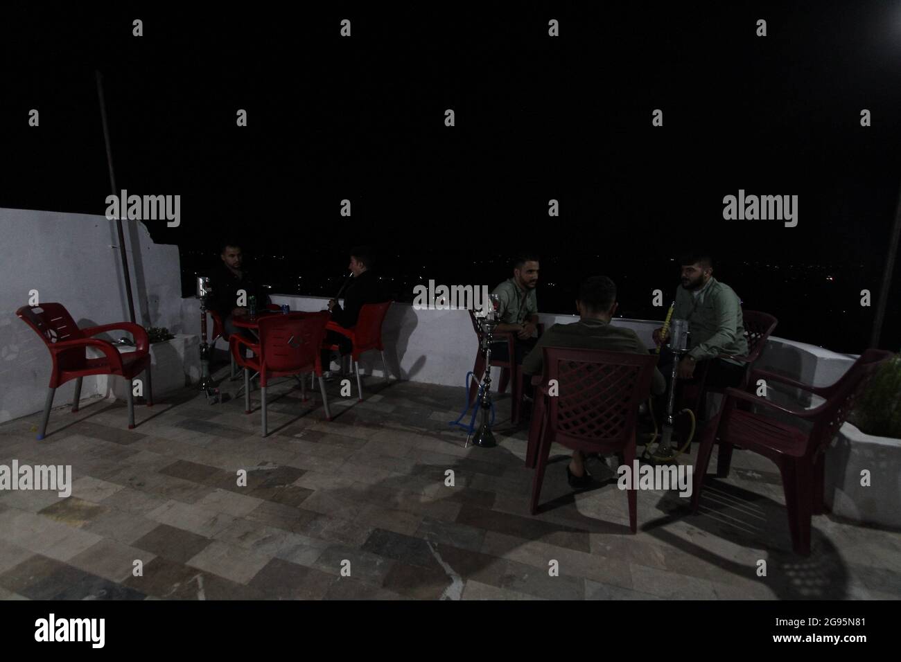 July 23, 2021: The pictures show a group of Syrian youths sitting on ...