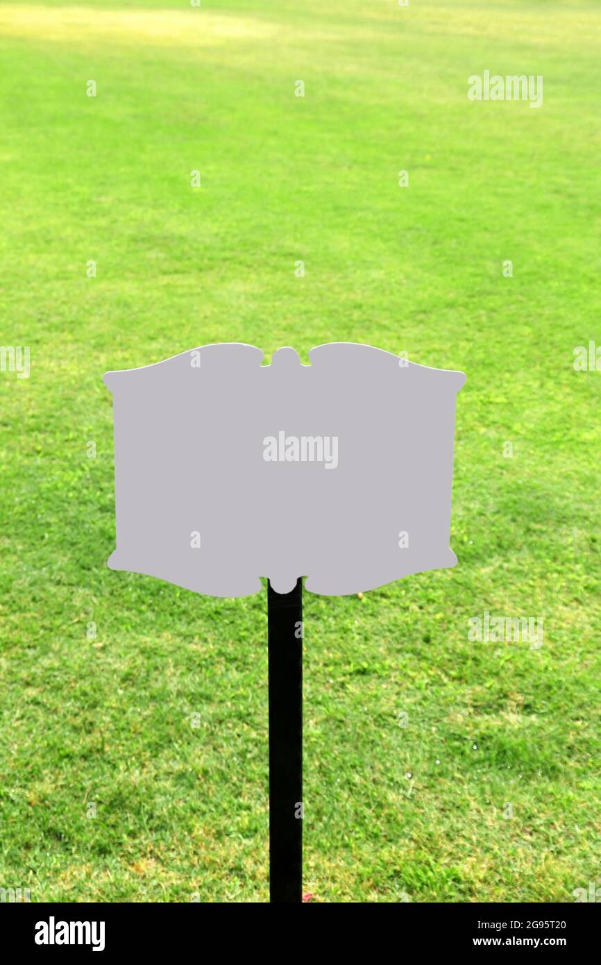 Signboard on lawn Stock Photo - Alamy