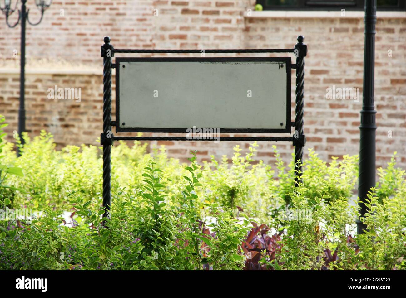 Signboard on lawn Stock Photo - Alamy