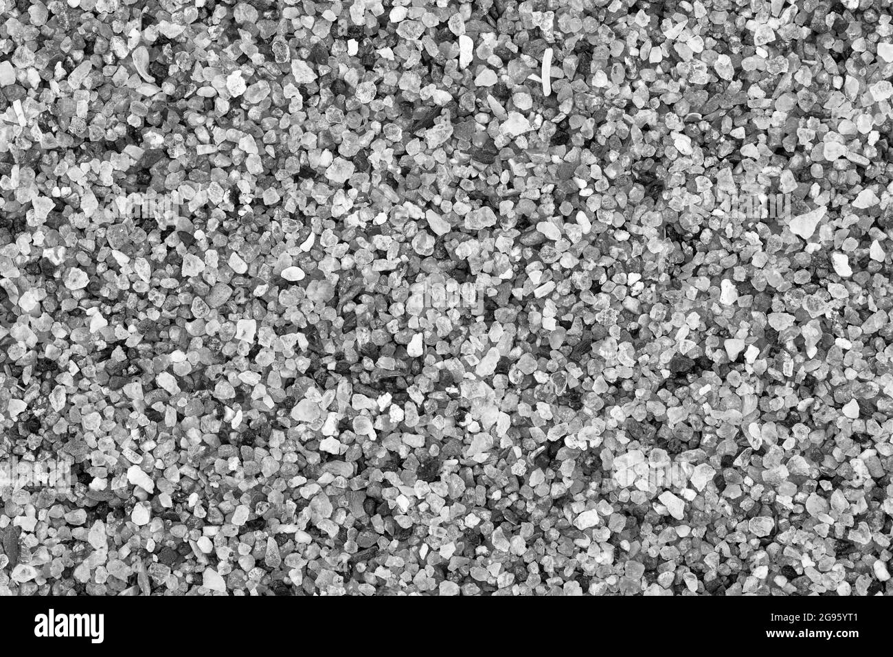 Black & white macro close-up of coarse sand grains. Abstract sand ...
