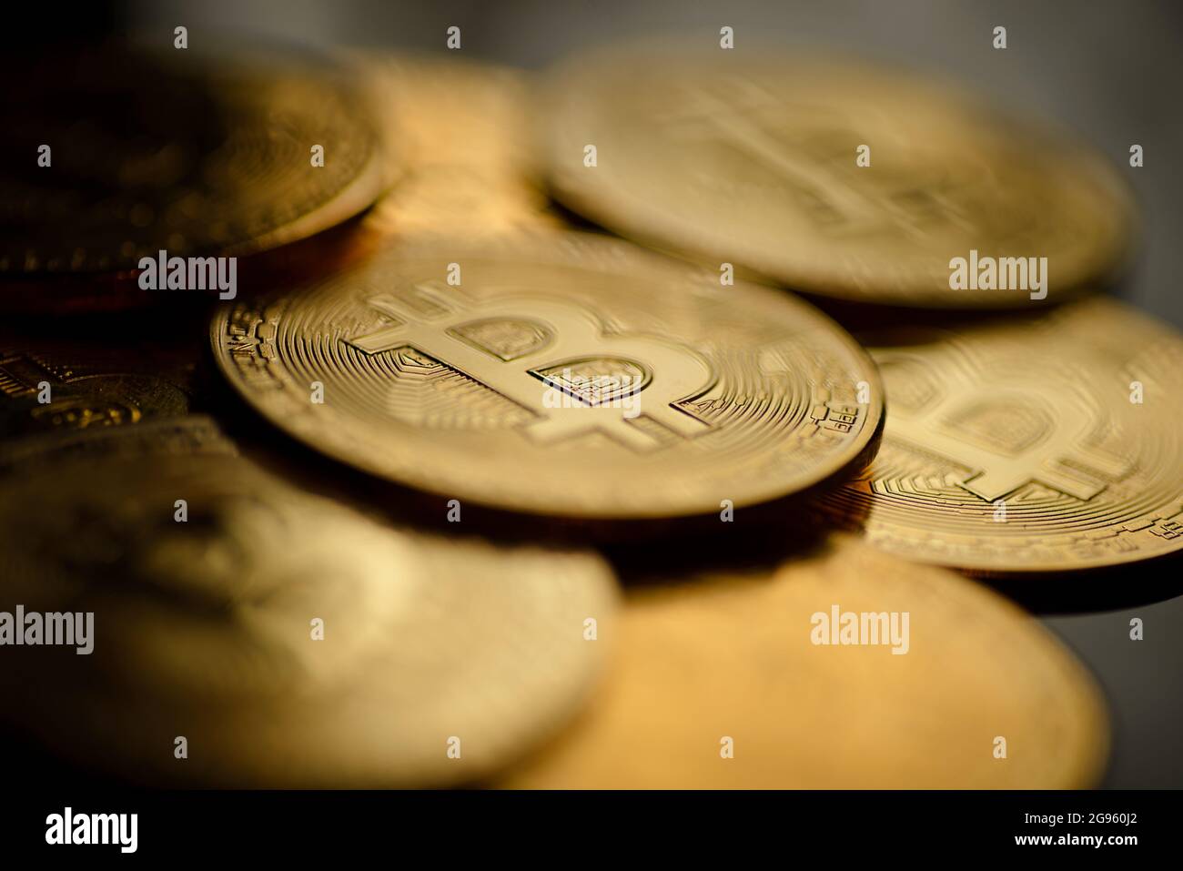 Close up of pile of bitcoin coins high contrasted image Stock Photo - Alamy