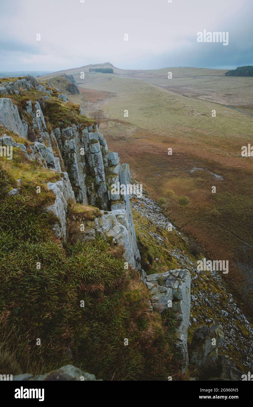 An endless cliff runs alongside the path of Hadrian's Wall in the ...