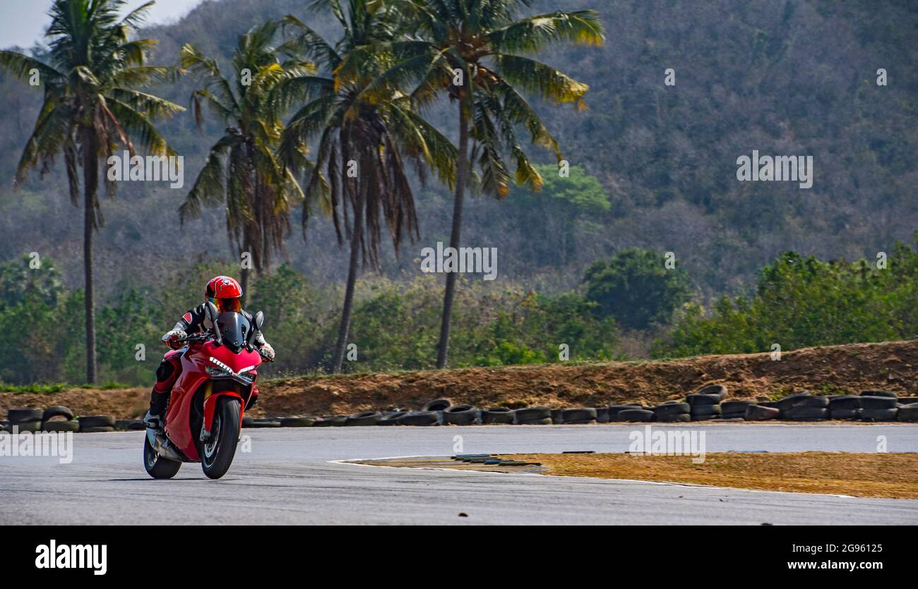 man practising laps on race track with his motorcycle Stock Photo - Alamy