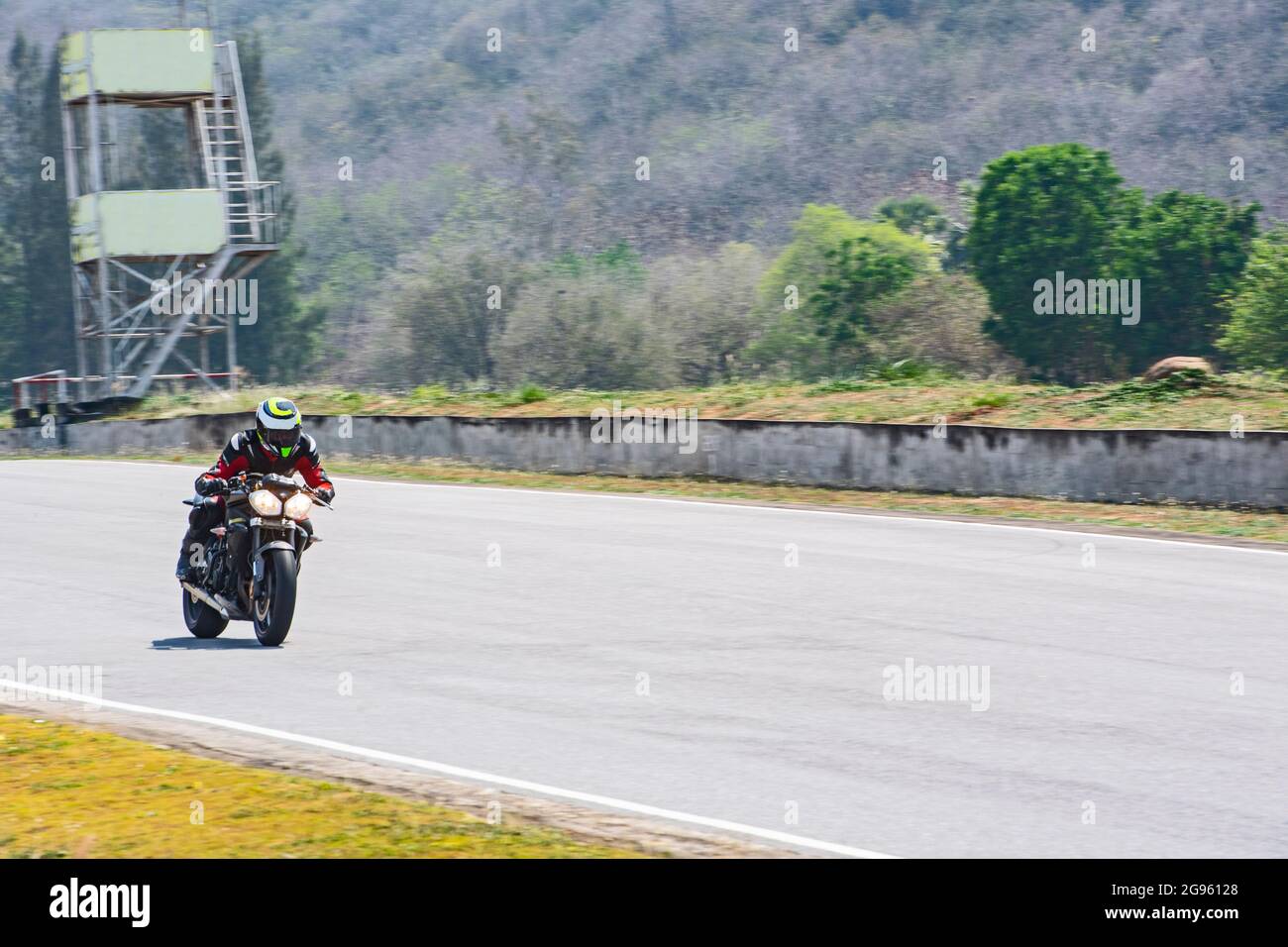 man practising laps on race track with his motorcycle Stock Photo - Alamy