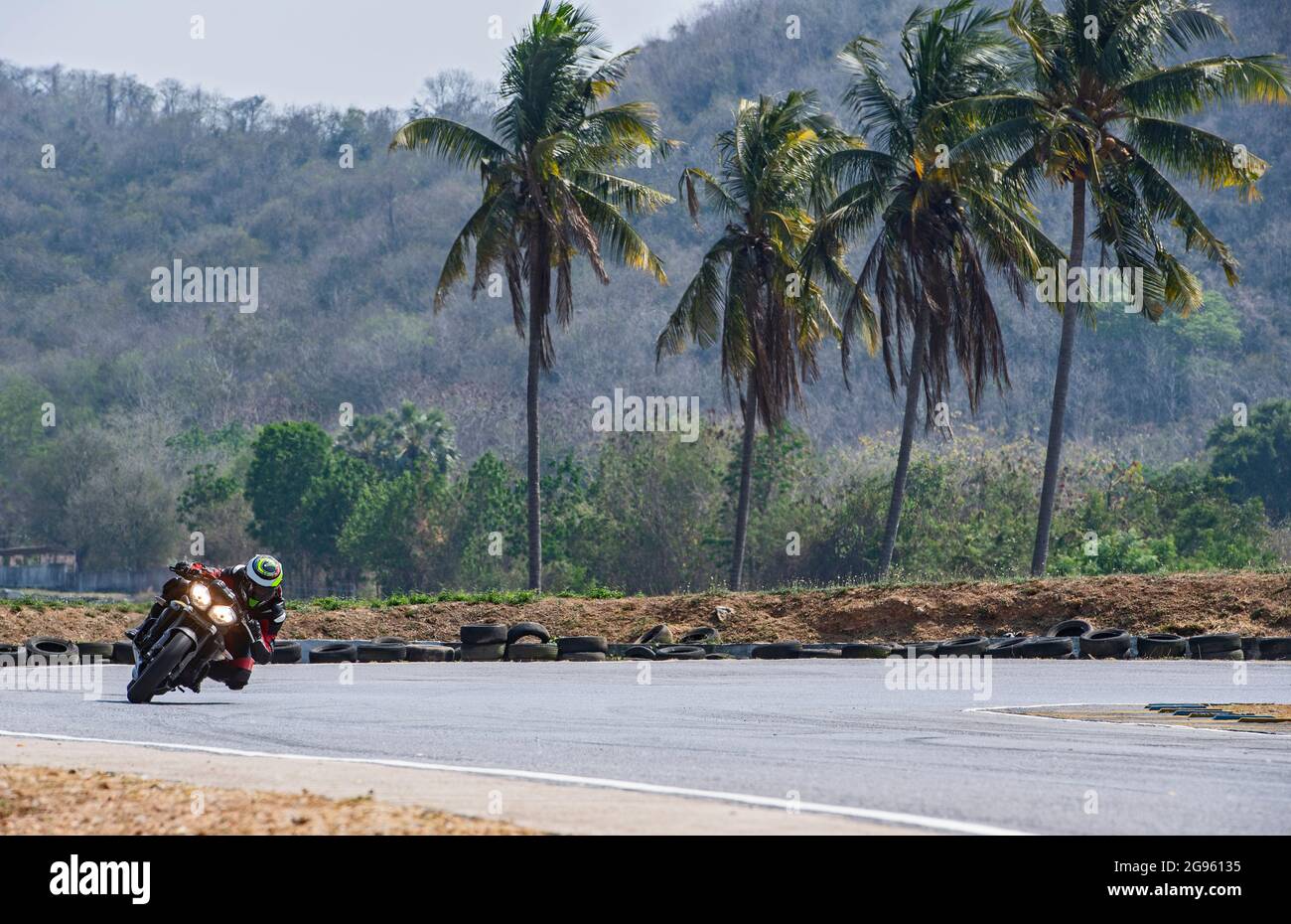 man practising laps on race track with his motorcycle Stock Photo - Alamy