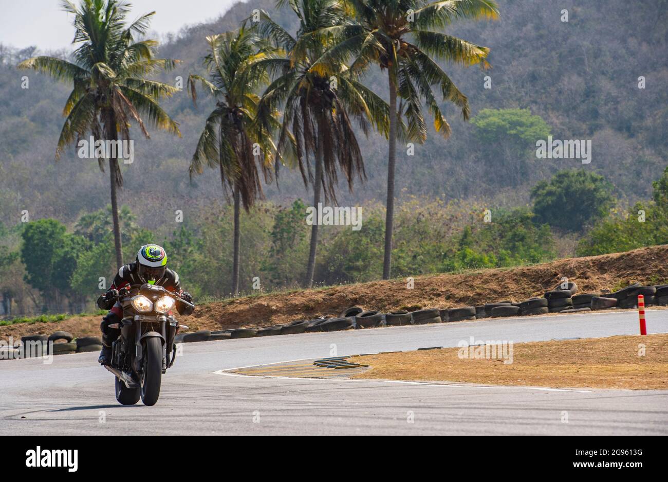 man practising laps on race track with his motorcycle Stock Photo - Alamy