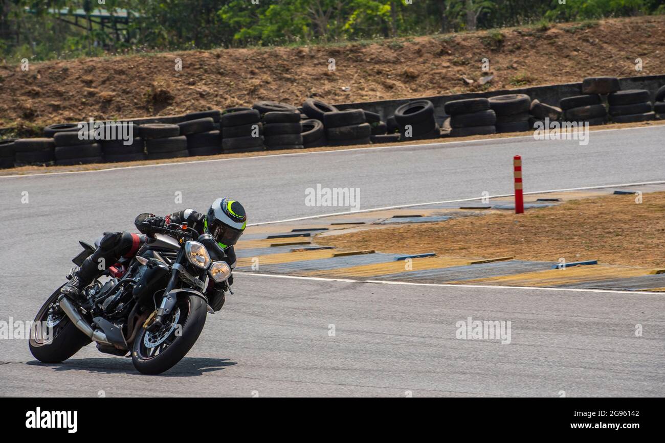 man practising laps on race track with his motorcycle Stock Photo - Alamy