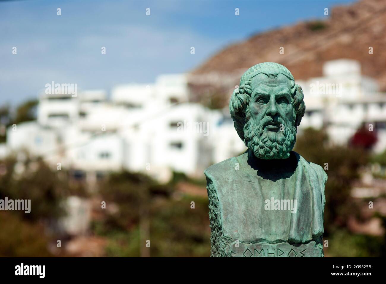 Greece, the island of Ios, the statue of Homer at the islands harbour ...