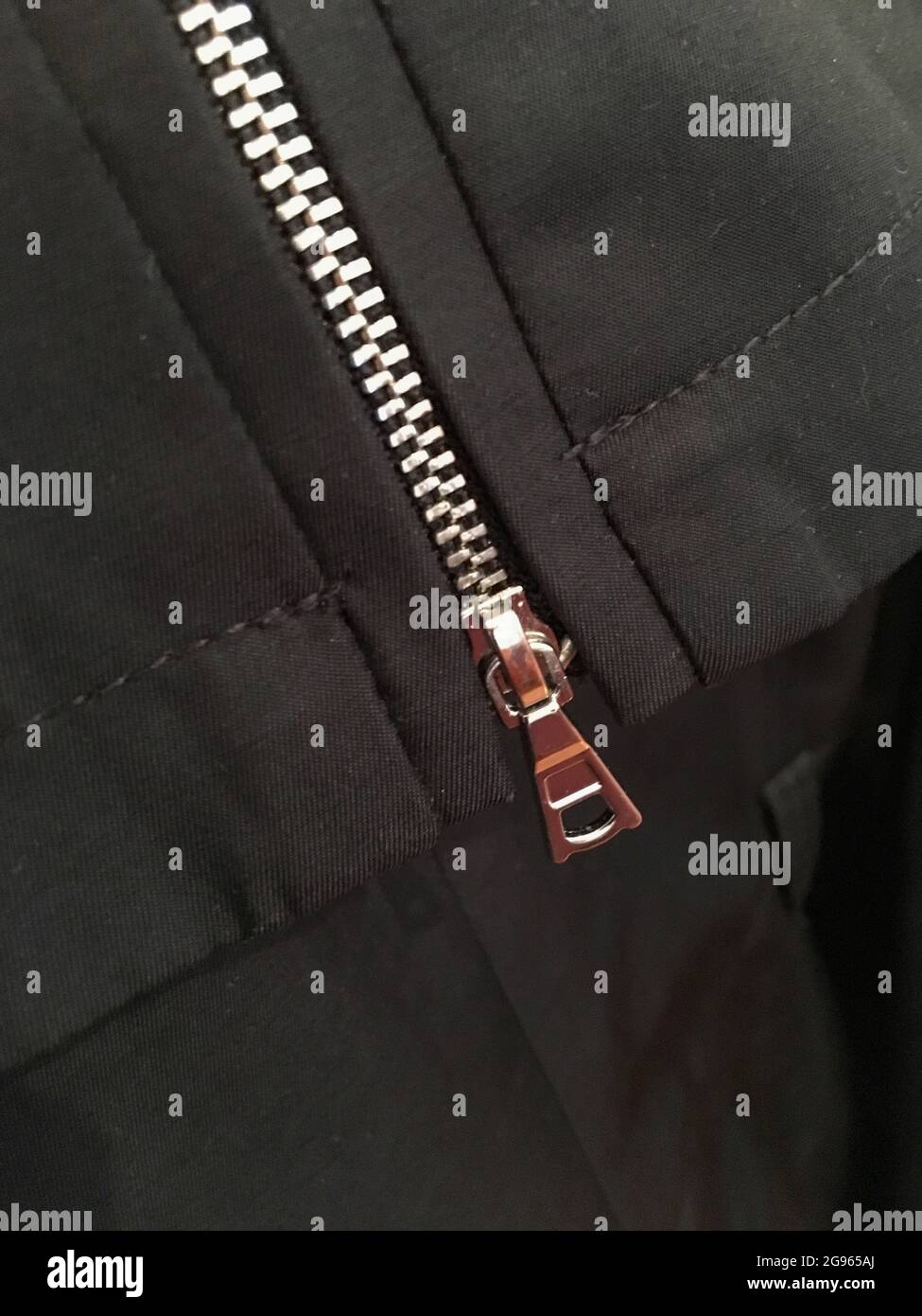 Black zippered jacket hi-res stock photography and images - Alamy