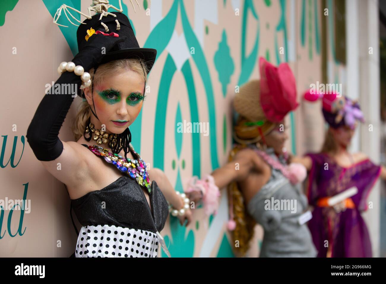 London, UK. 24th July, 2021. Models showcase Pierre Garroudi's latest ...