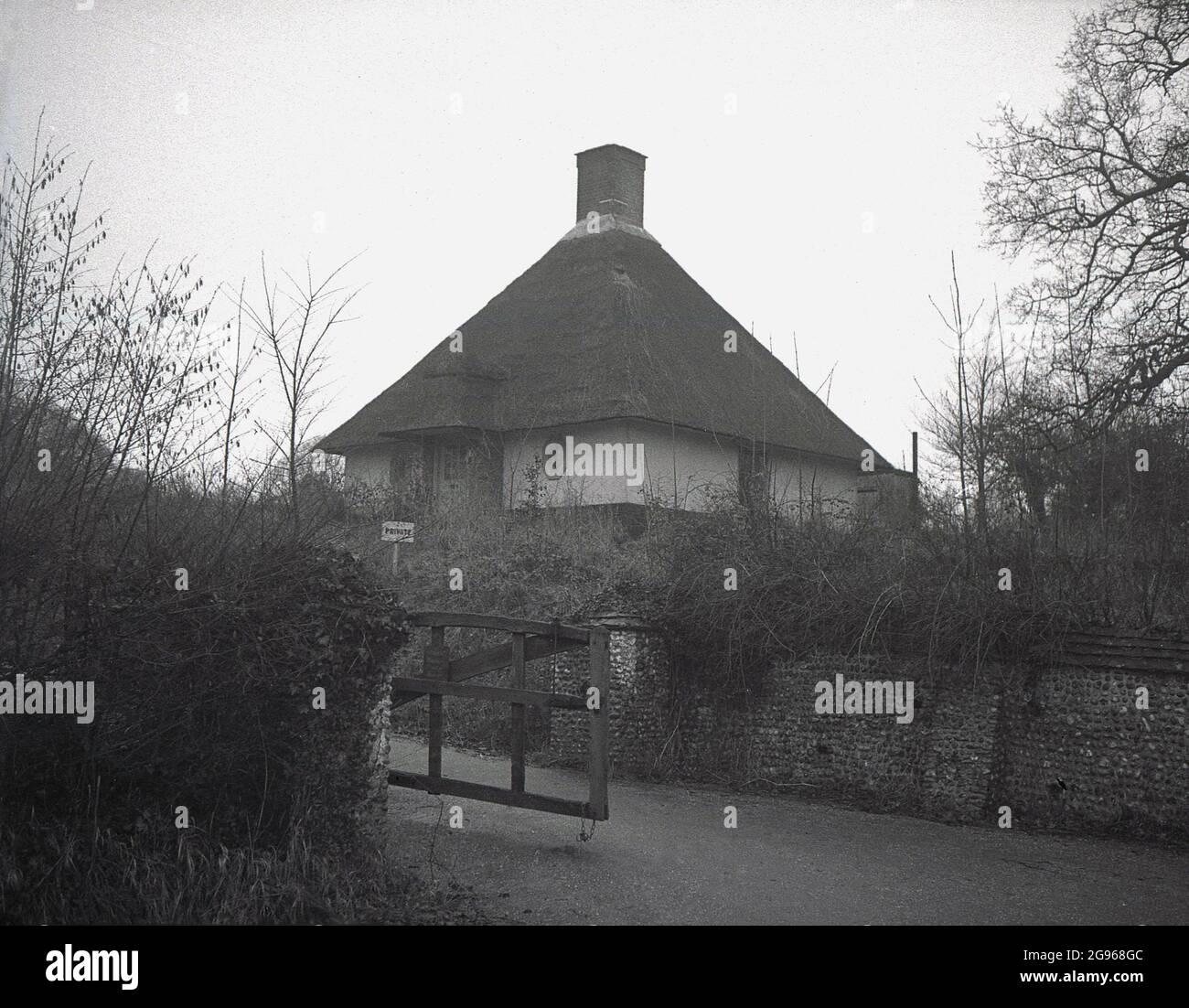 1950s, historical, exterior view of a rural cottage on the South Downs ...