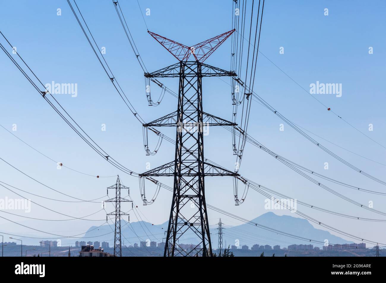 Electric poles carrying high voltage electricity Stock Photo - Alamy
