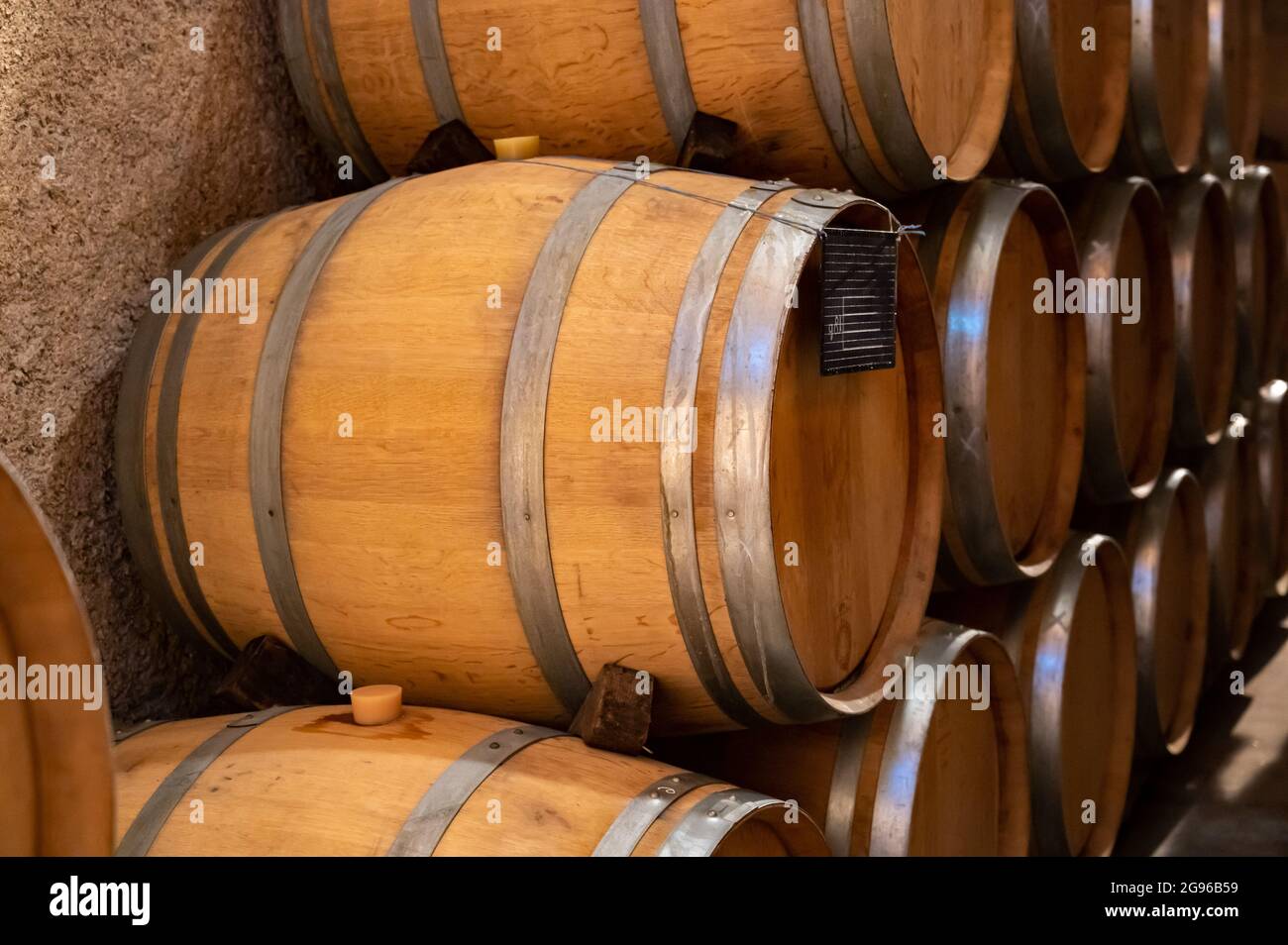 Keeping for years of dry red wine in new oak barrels in caves in ...
