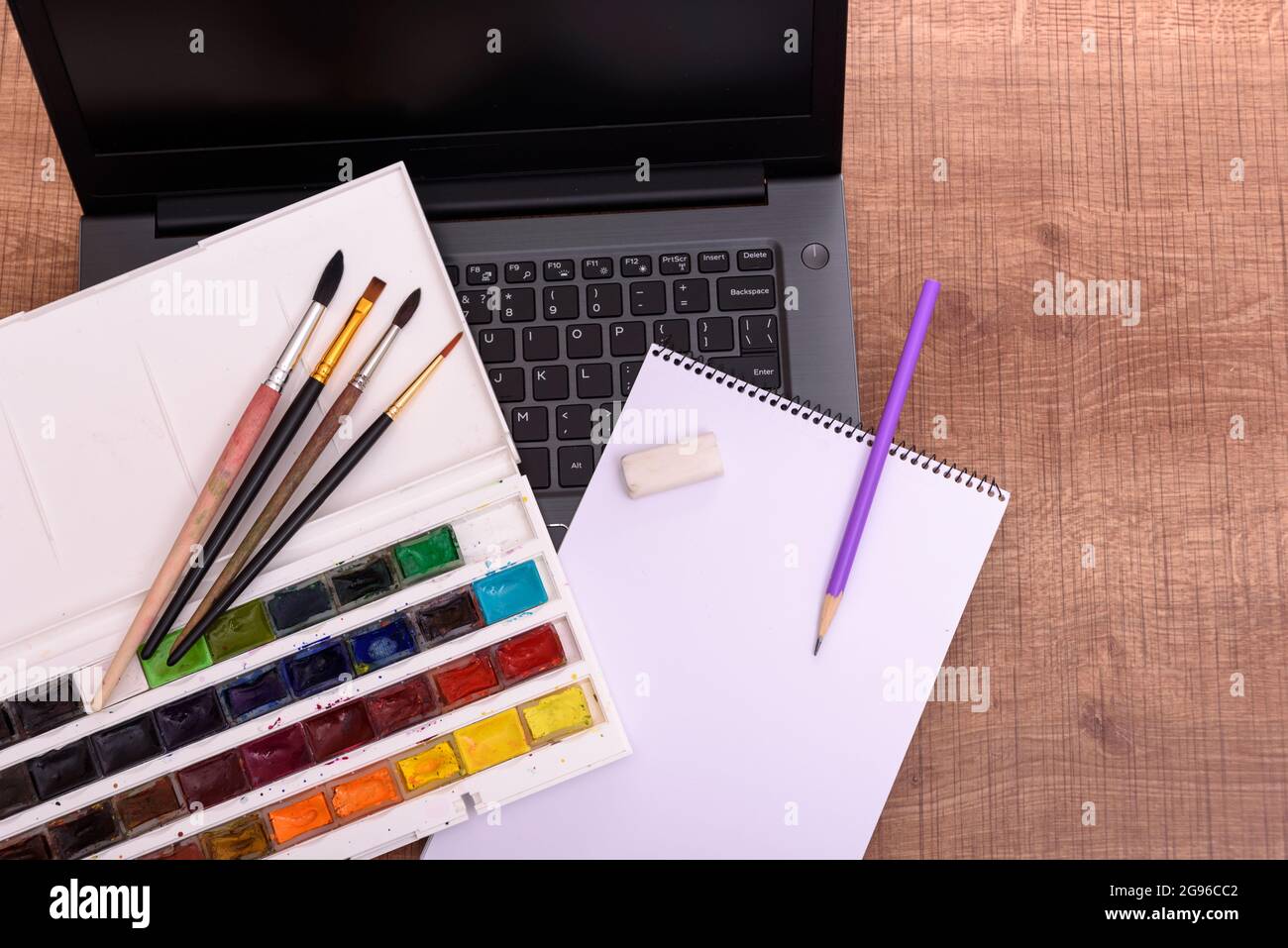 Online drawing class cover concept with laptop, sheet of paper, paints ...