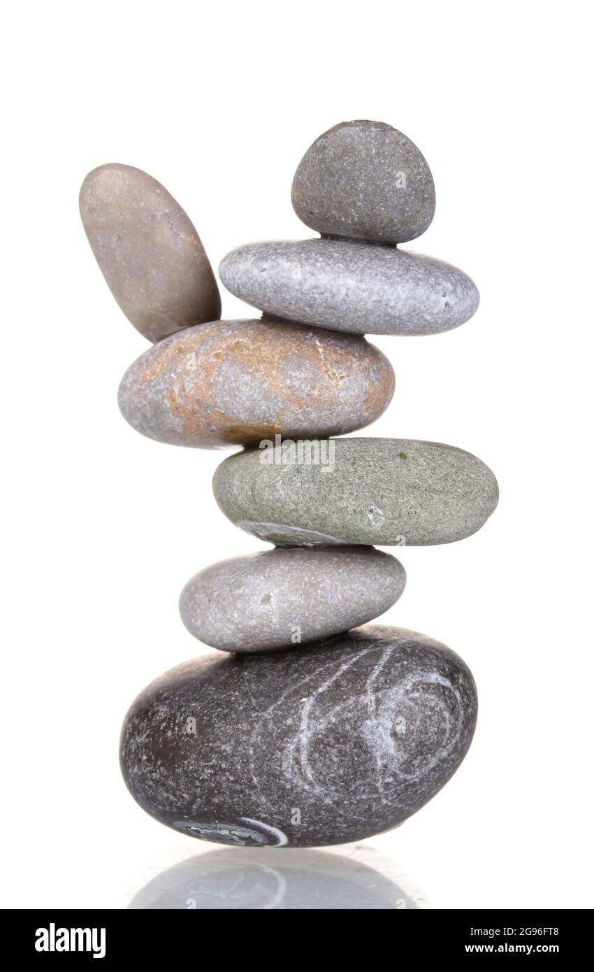Stack of balanced stones isolated on white Stock Photo - Alamy