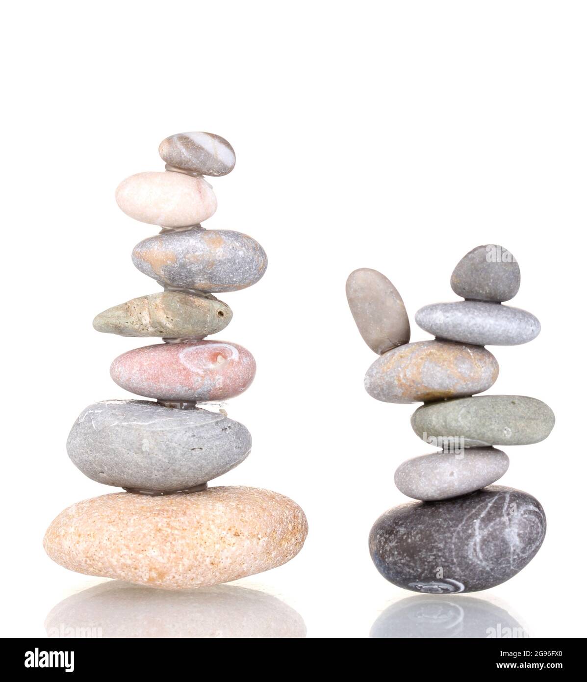 Stacks of balanced stones isolated on white Stock Photo - Alamy