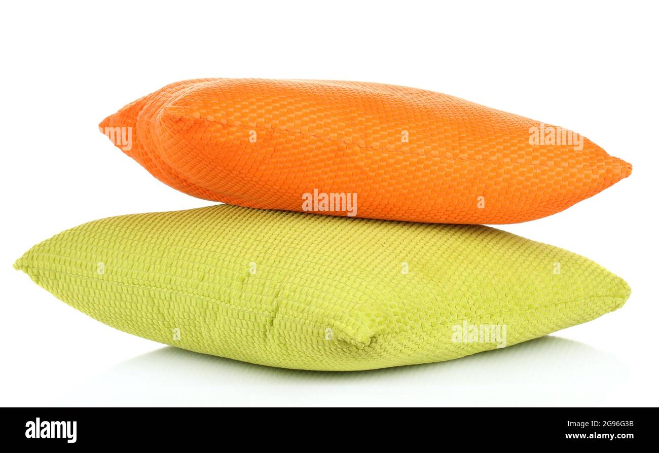 Bright color pillows isolated on white Stock Photo - Alamy