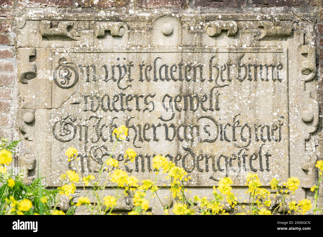 Text stone with old-Dutch language in the brick wall of the Southern ...