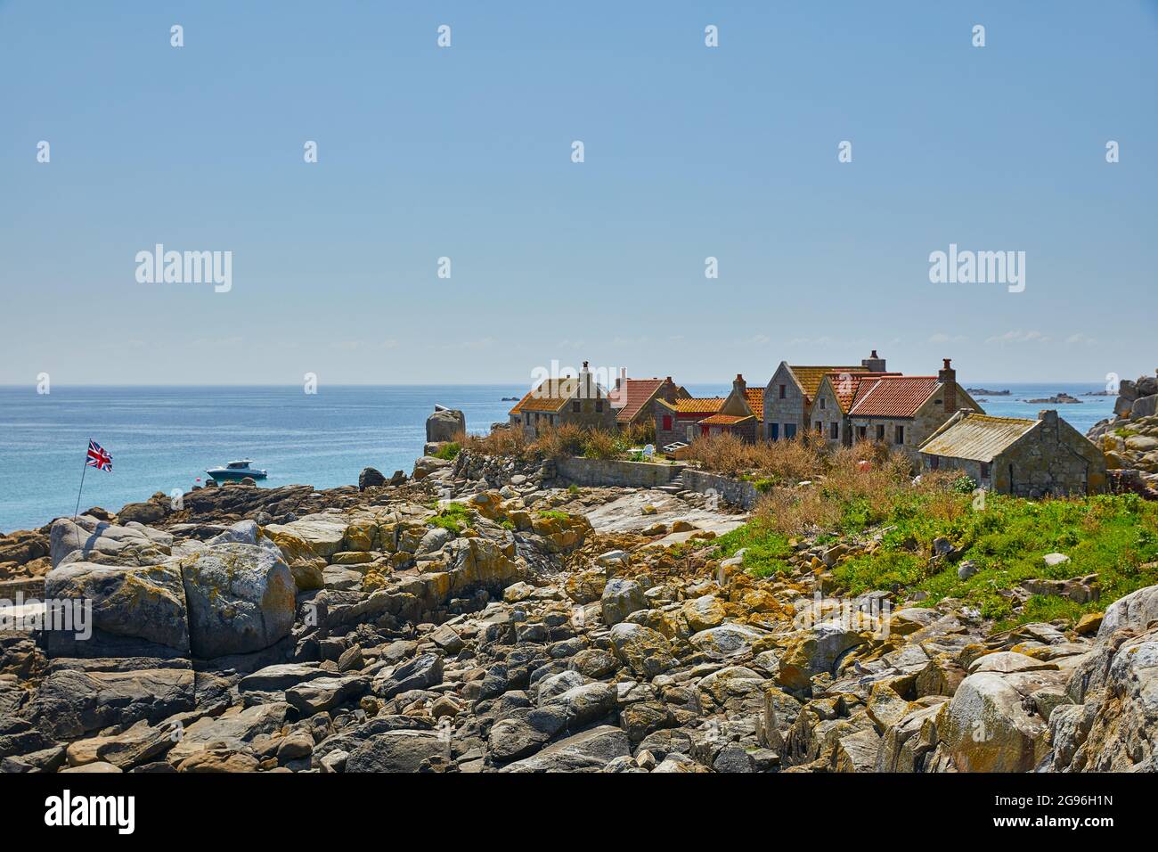 Image of Les Minquiers, Ile Maitre Island with a clear blue sky and ...