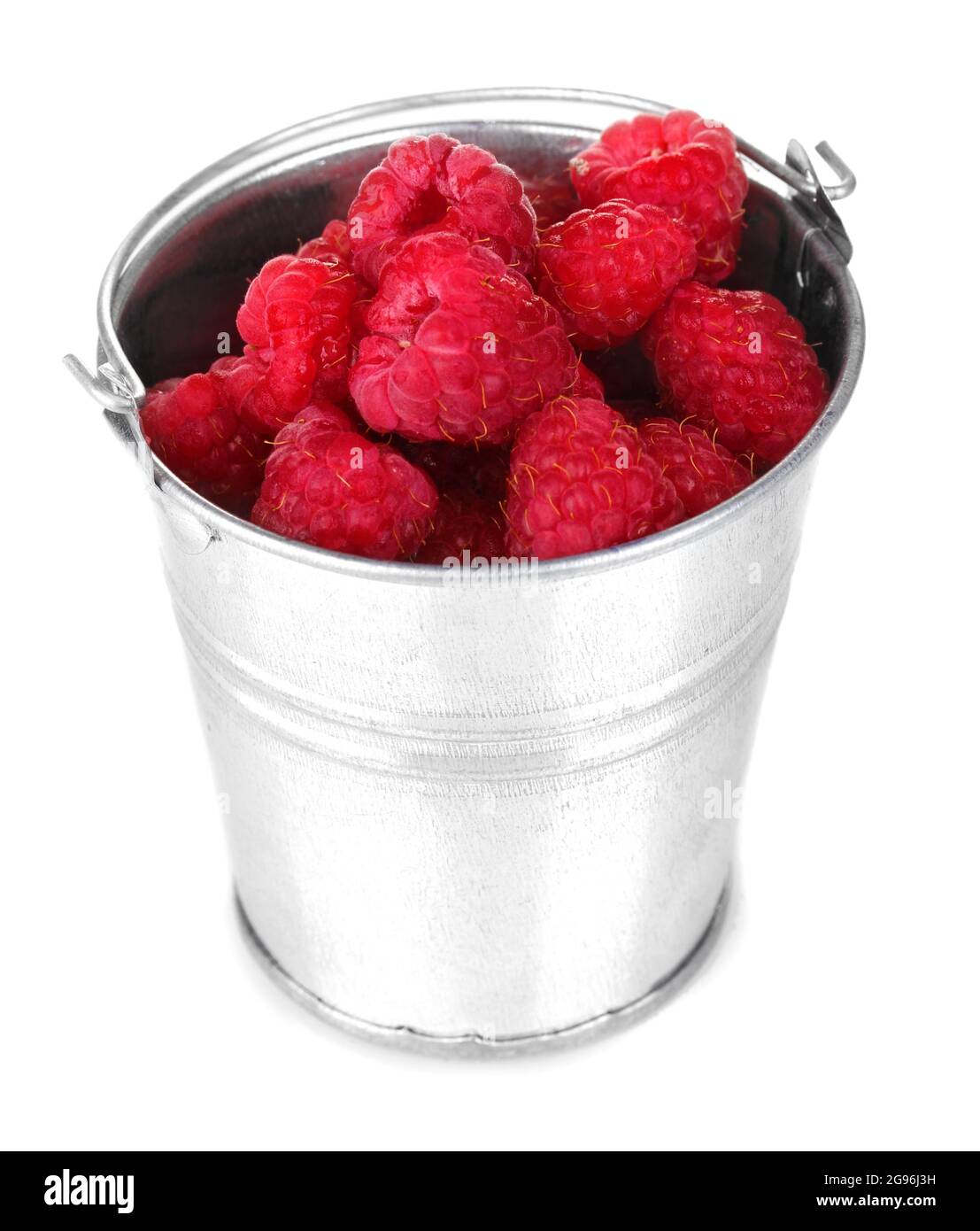 Raspberries in metal bucket isolated on white Stock Photo - Alamy